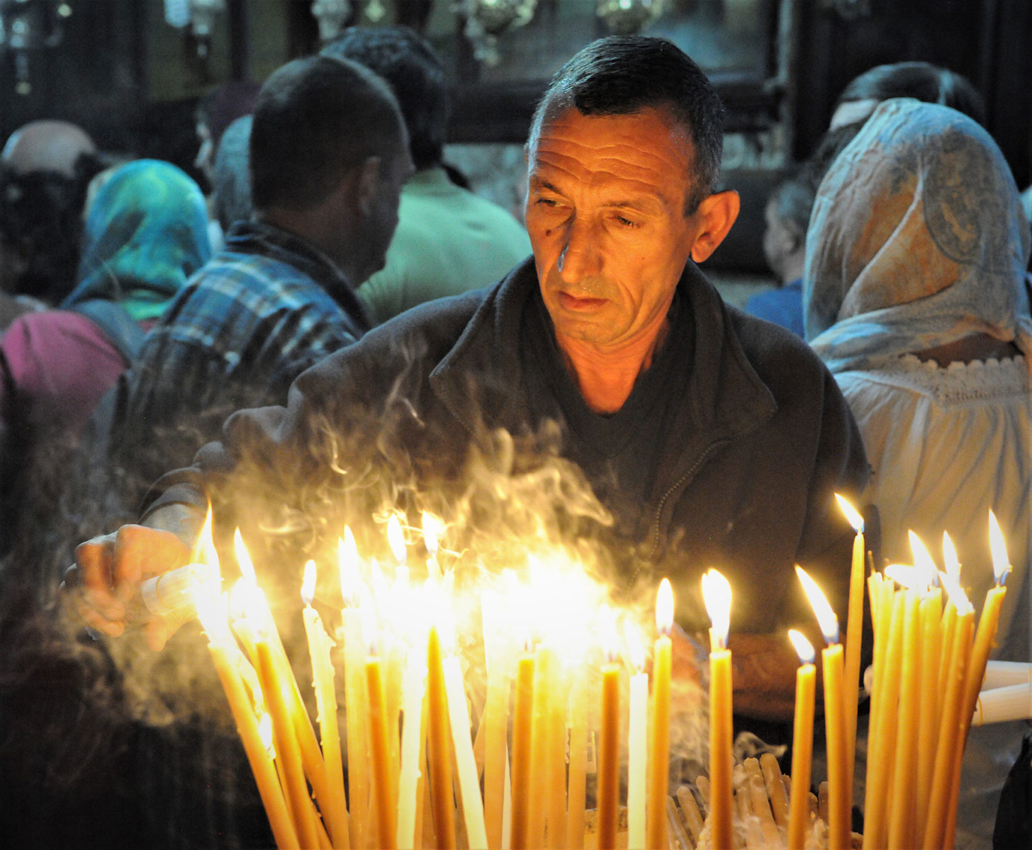 Candles Handler - Yousef Khanfar Photography